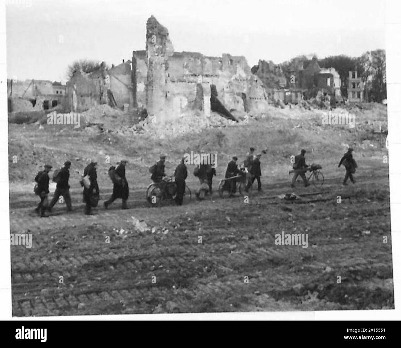 CALAIS RETURNS TO LIFE. - French civilians workers, after a day's work ...