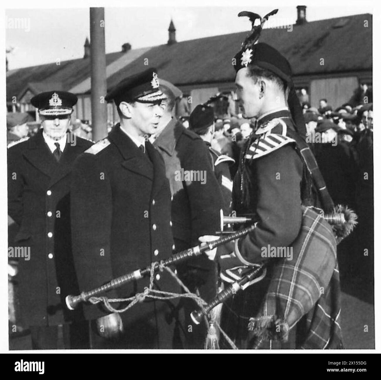 THE KING AND QUEEN IN SCOTLAND - His Majesty chatting to the Pipe Major ...