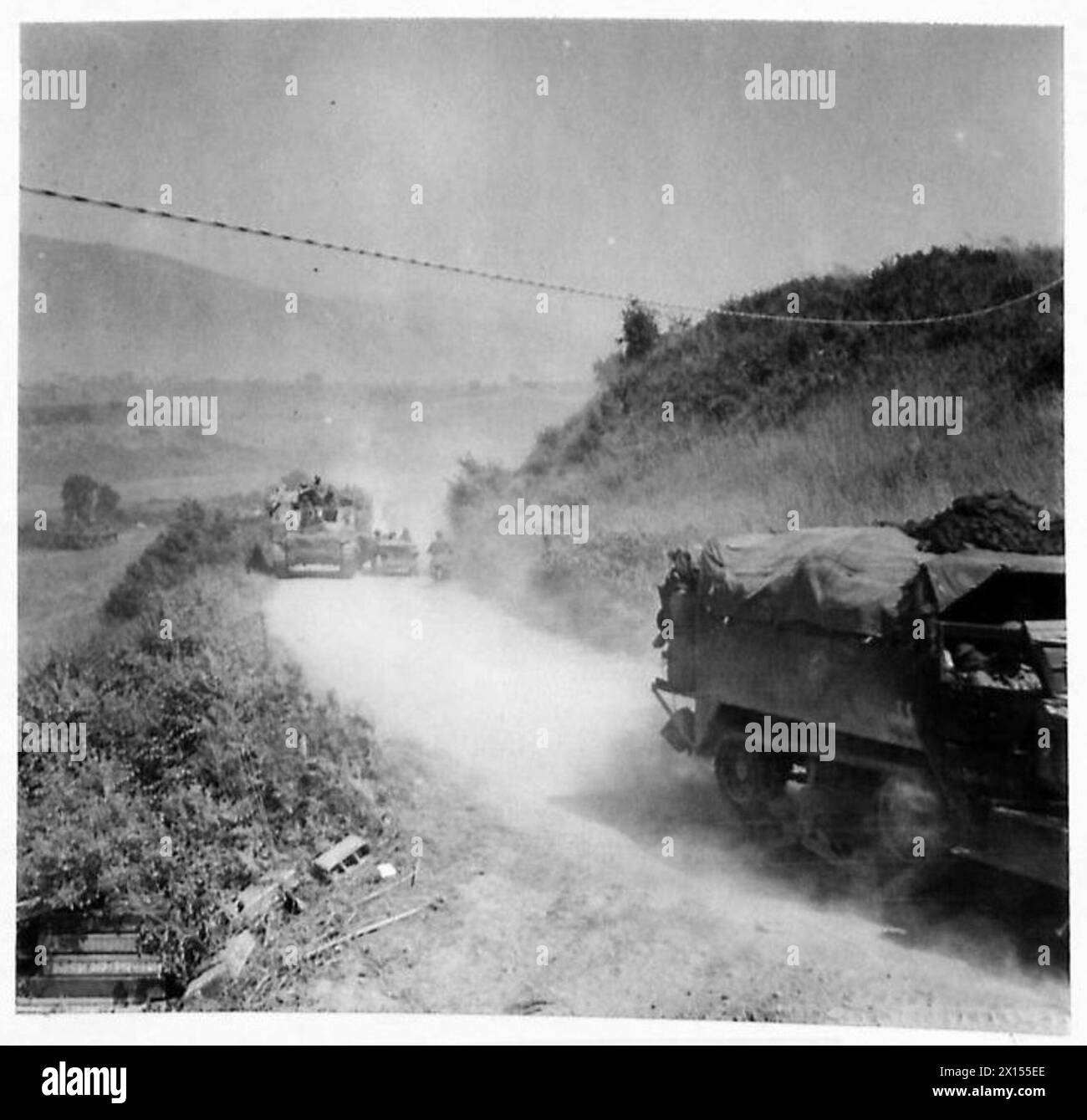 Prist guns advance to support American infantry moving north towards ...