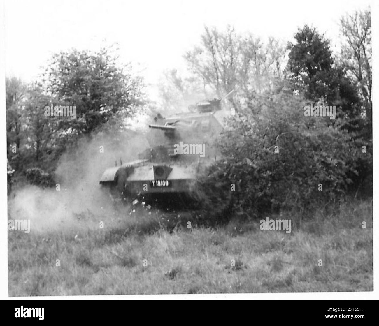 TANKS IN ACTION - Cruiser tanks smashing through walls and hedges ...