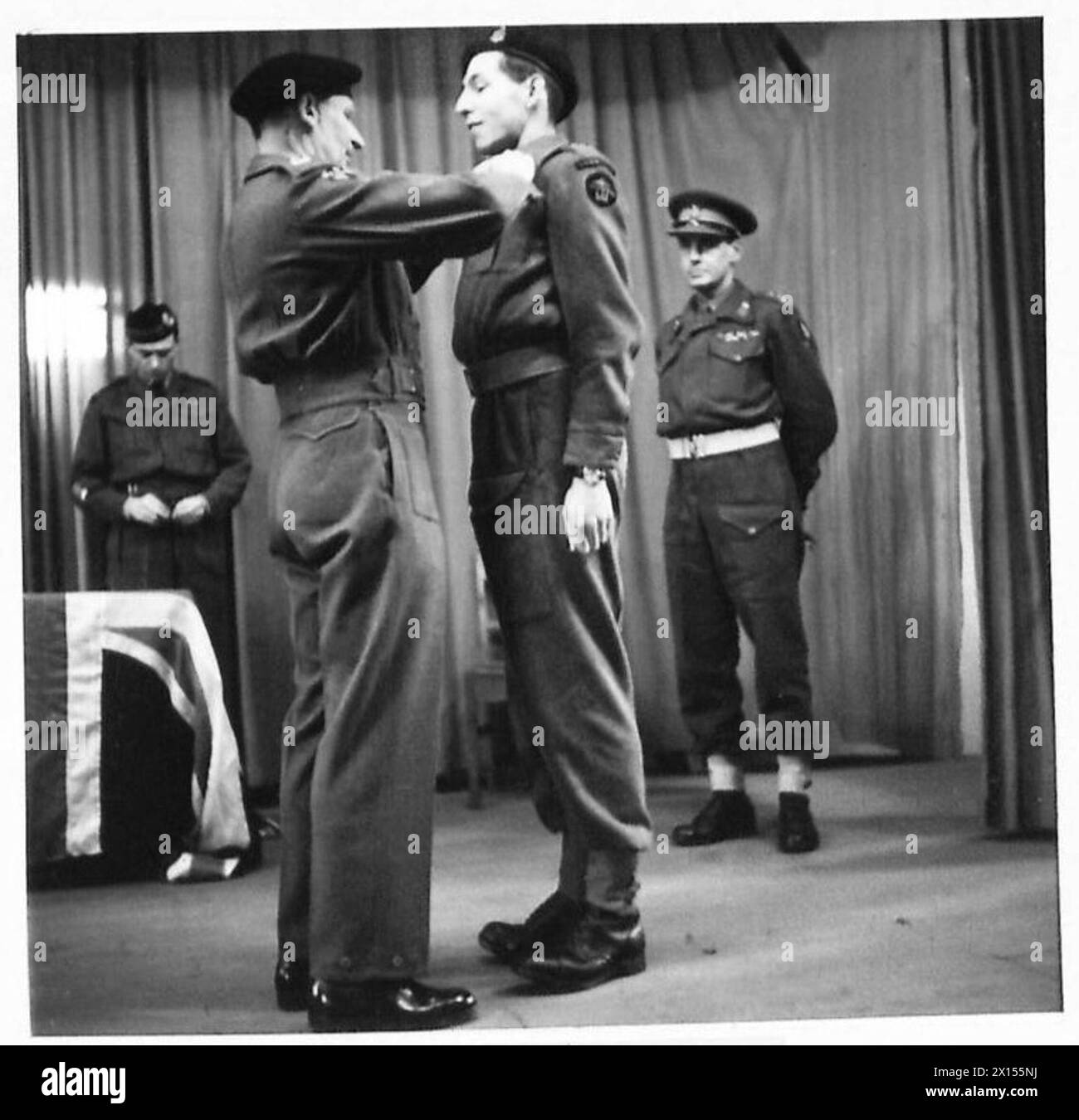 INVESTITURE BY FIELD MARSHAL MONTGOMERY - Captain Tulloch RAMC receives ...