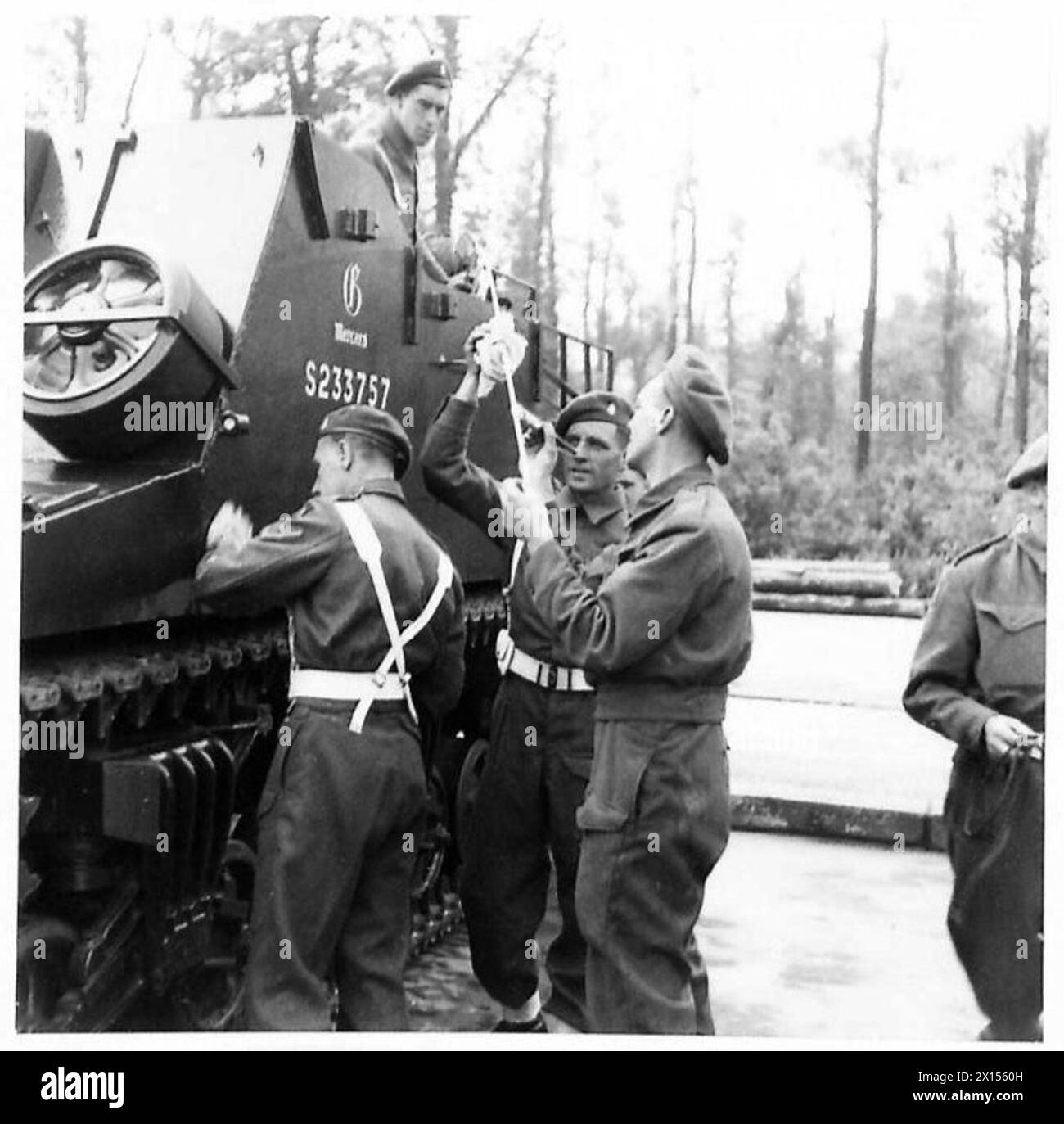 Corporal L. Comley, Gunner E. Mortimer, and Sergeant W. Spence of G ...