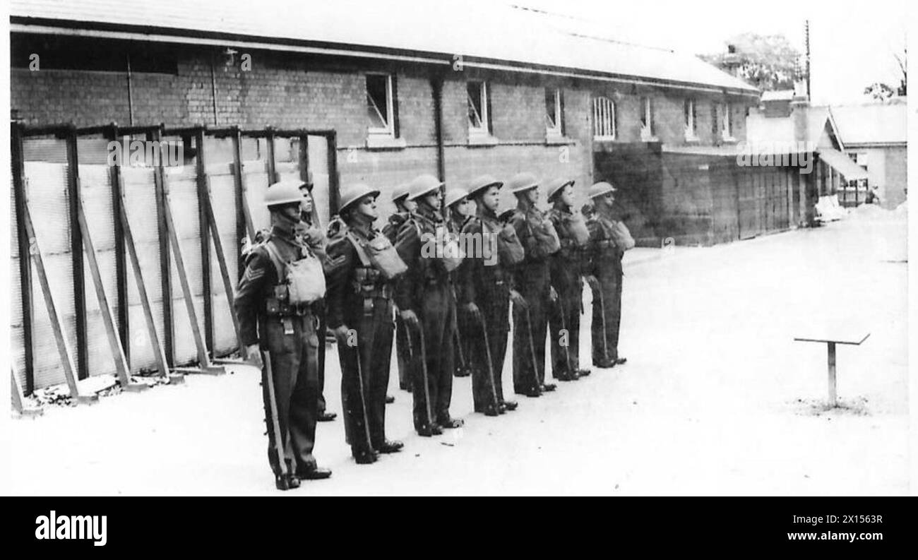 Young recruits in the British Army practice rifle drills to develop ...