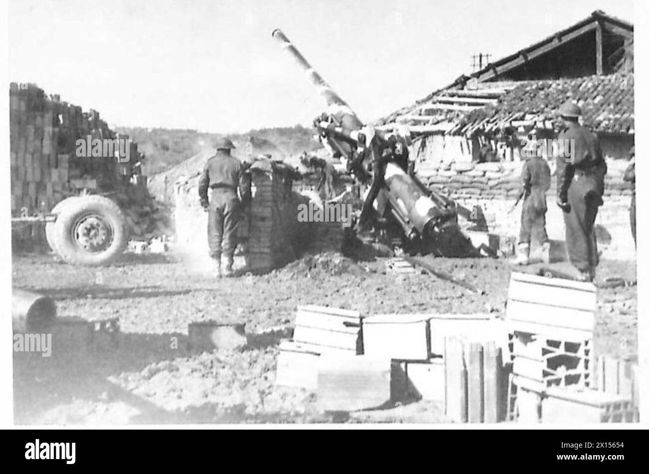 British troops are shown using American heavy artillery, with the ...