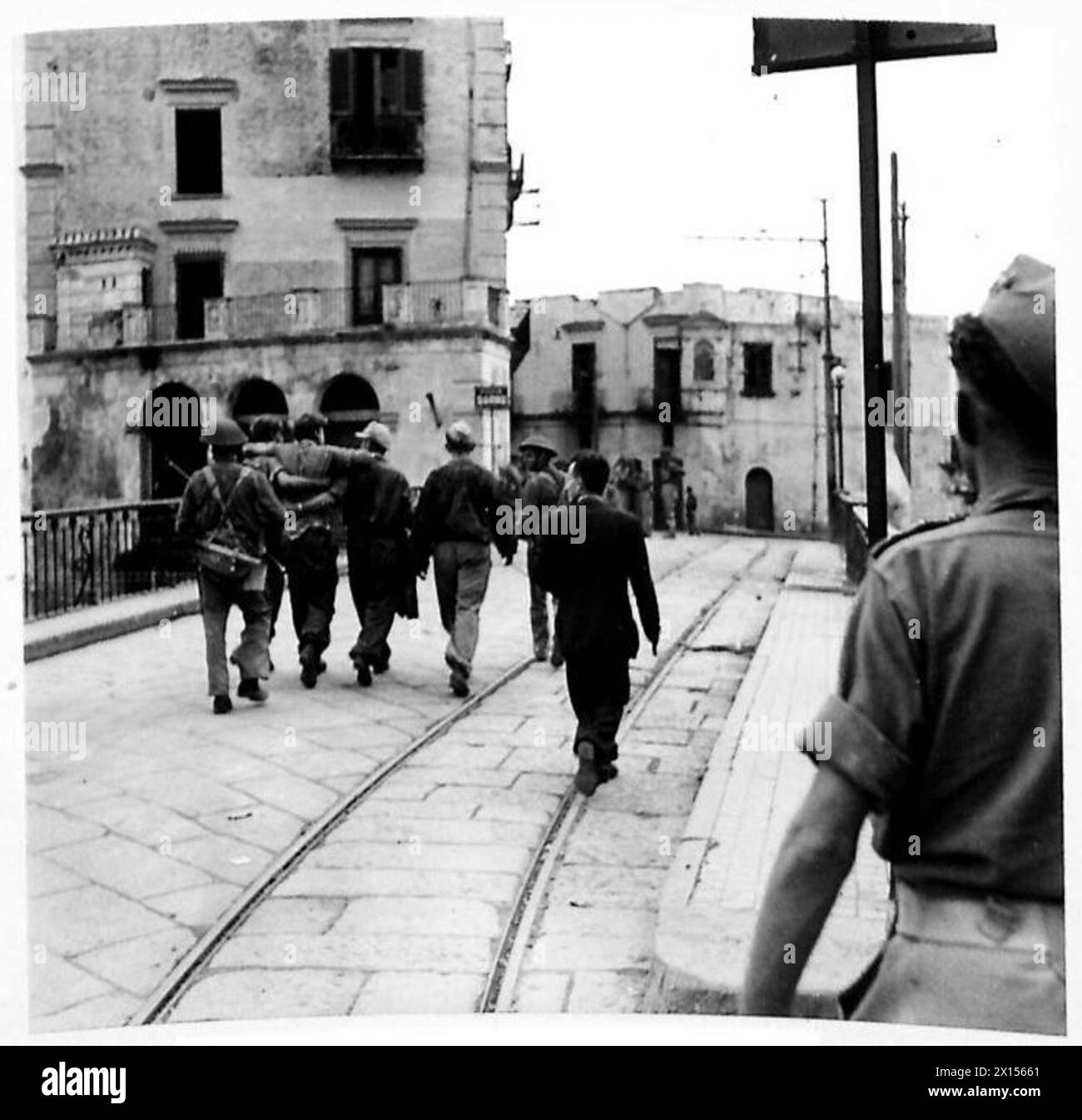 Soldiers of the 1/6 Queen's Regiment capture the town of Scafati as the ...