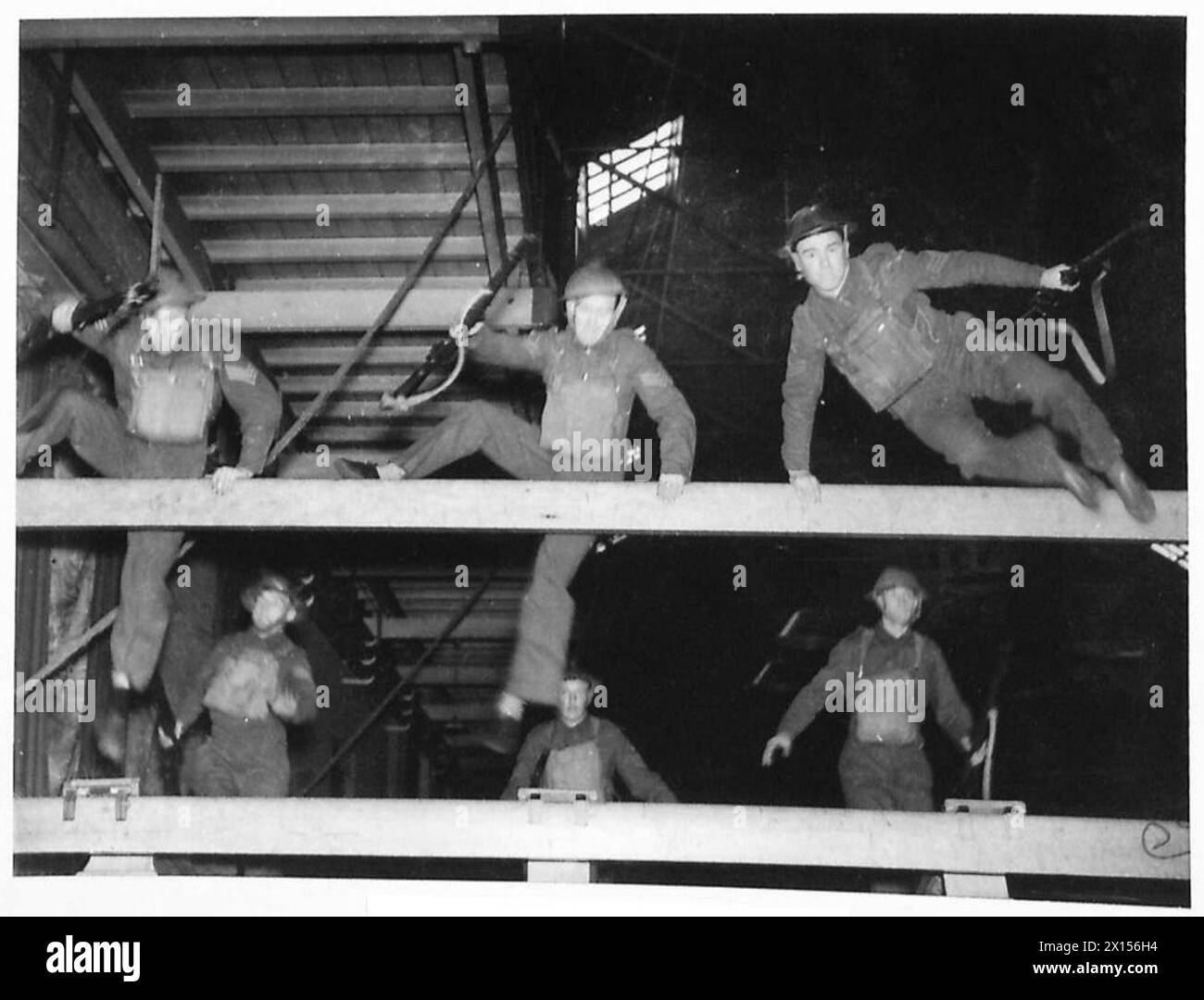 Men train as physical training instructors while carrying rifles and ...