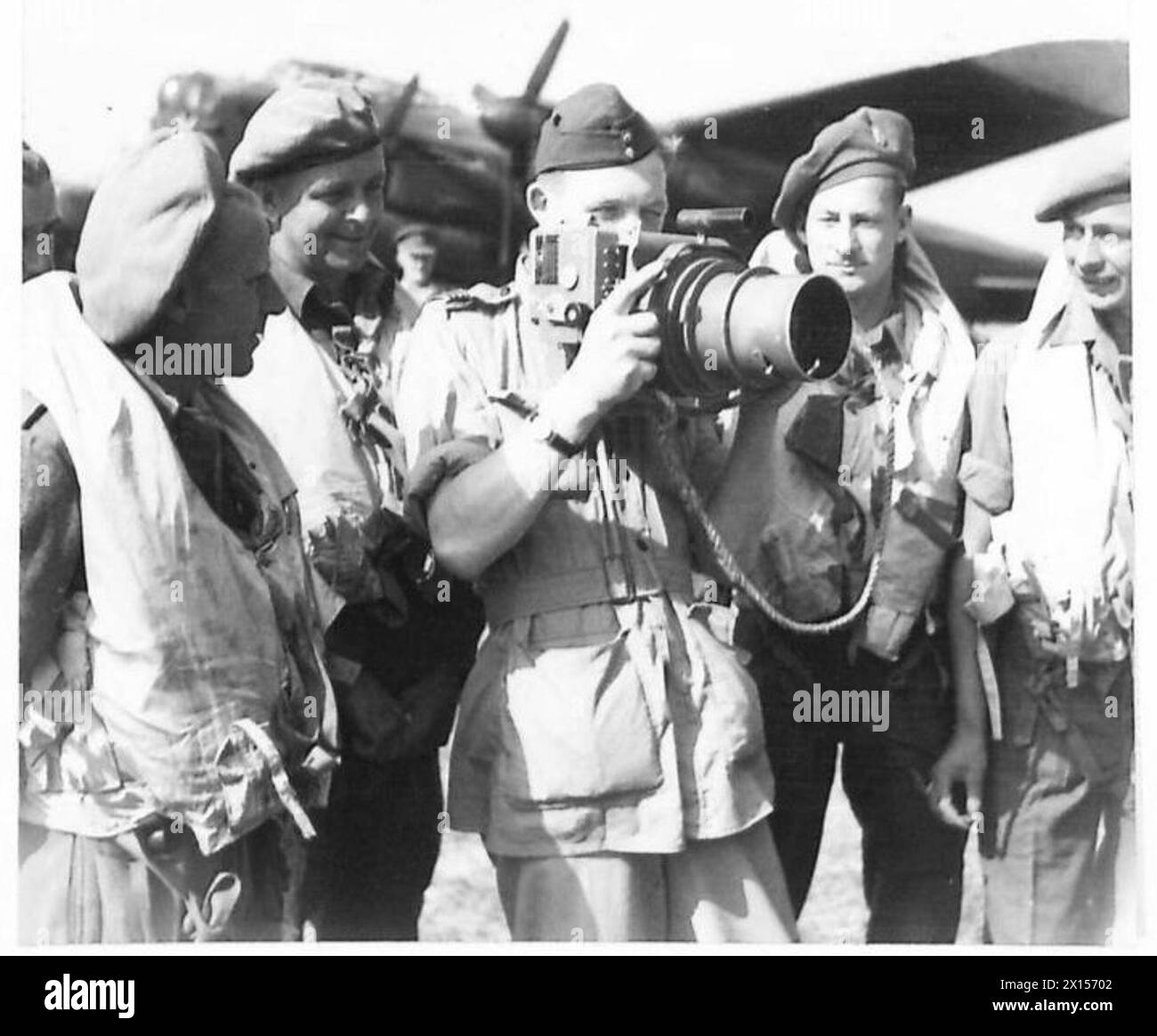 ITALY : "PYTHON" MEN FLY HOME - F/Lieut. J.T. Edwards shows the boys an ...