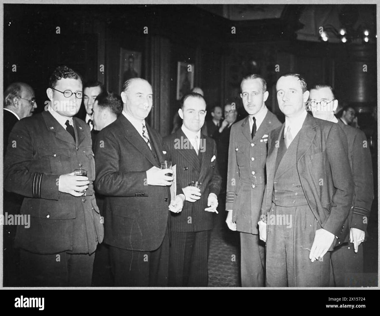 A photograph shows Squadron Leader Kellogg, Bay Abidin Daver, Major ...