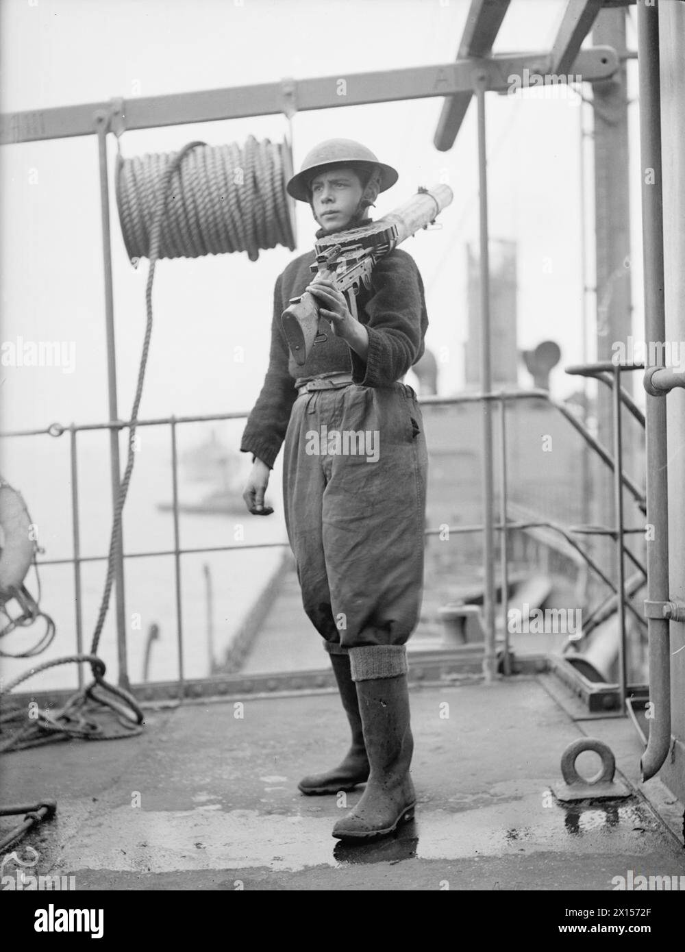 BRITAIN'S YOUNGEST MERCHANT SEAMAN GUNNER. 3 APRIL 1942, ON BOARD THE ...
