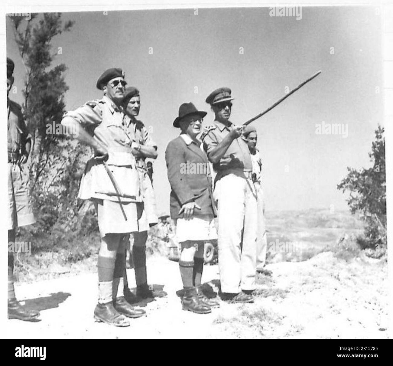 Mr. Amery, Major General Burch, and Brigadier Lovett observe positions ...