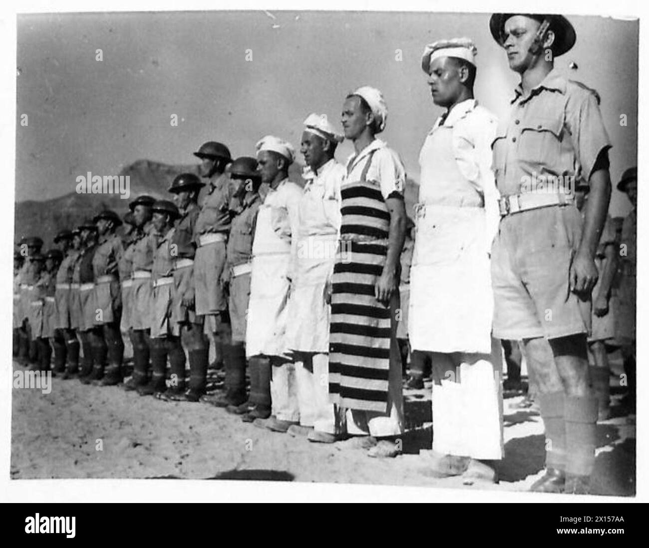 Butchers and bakers, along with other personnel, participate in a ...