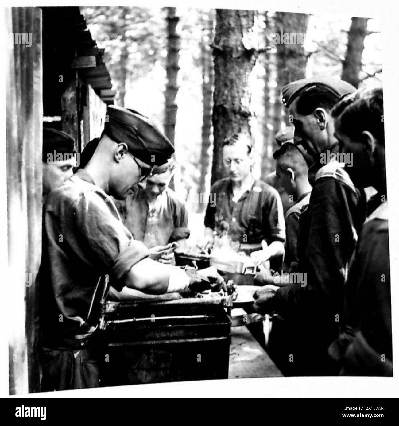 During a large-scale exercise, men of the British Army line up at a ...