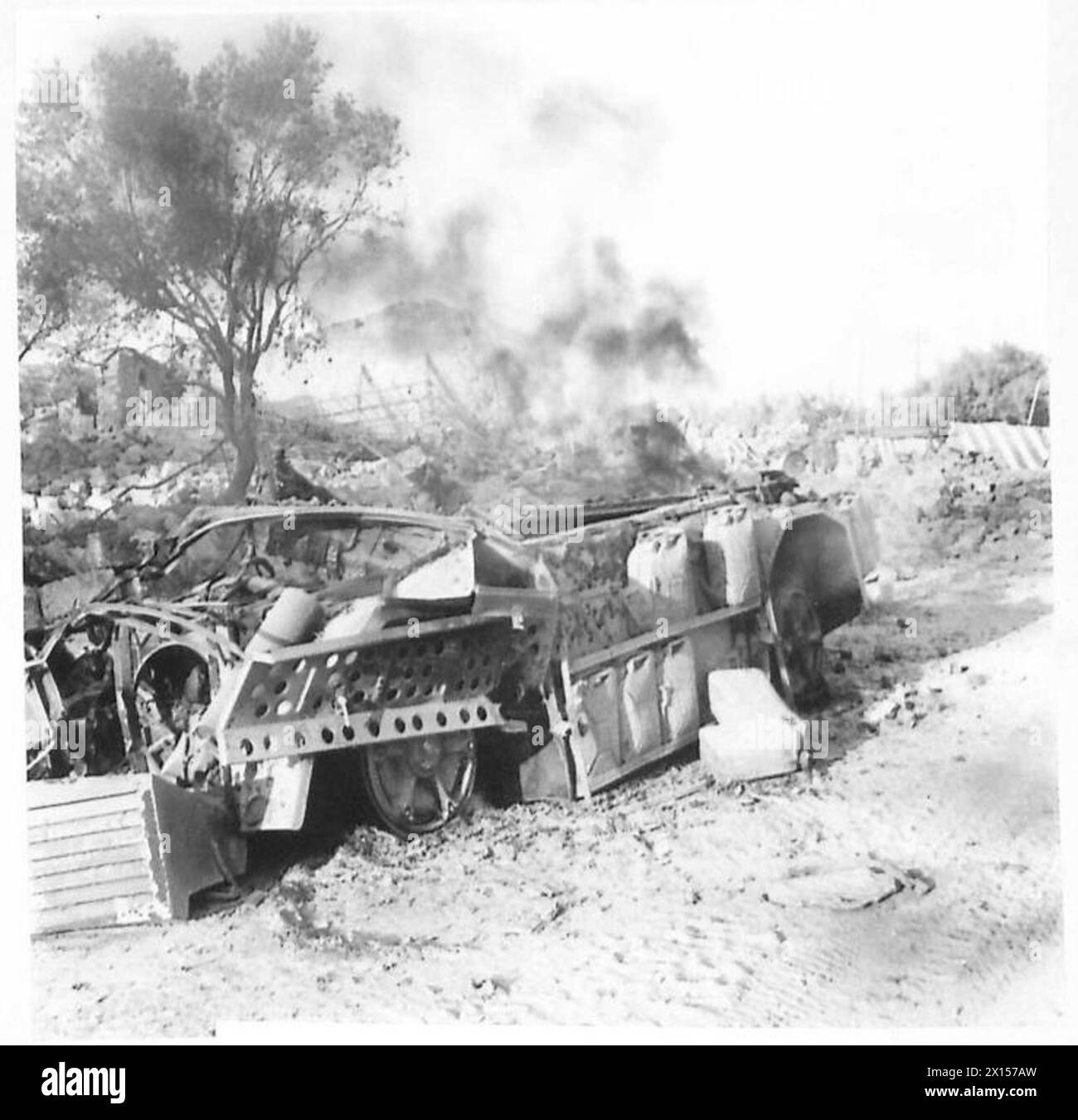 Italian transport vehicles burn near Lentini during the Battle of ...