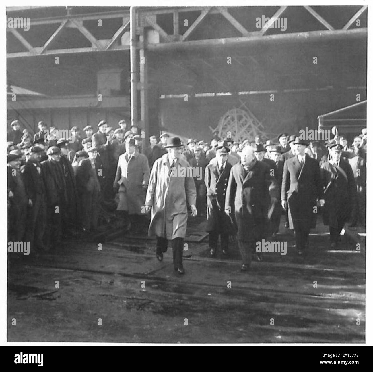 PRIME MINISTER'S TOUR - The Prime Minister walking round a shipyard ...