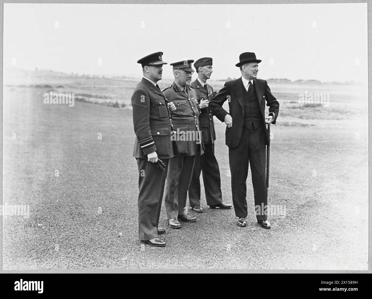 The Lord Mayor of London visiting a fighter station, accompanied by ...