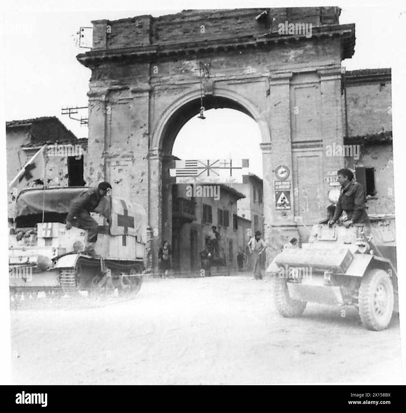 EIGHTH ARMY ADVANCE - Tanks enter the gateway at the entrance to Massa ...