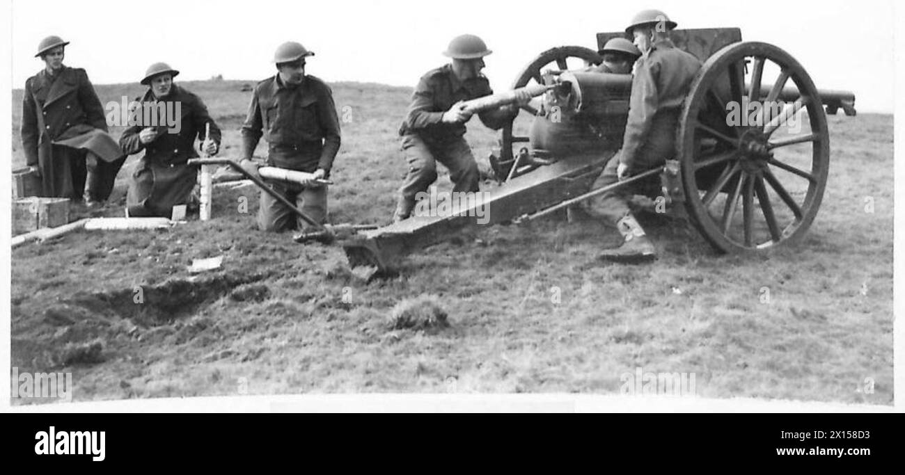 NORWEGIAN ARTILLERYMEN IN SCOTLAND - Views of the shells being loaded ...