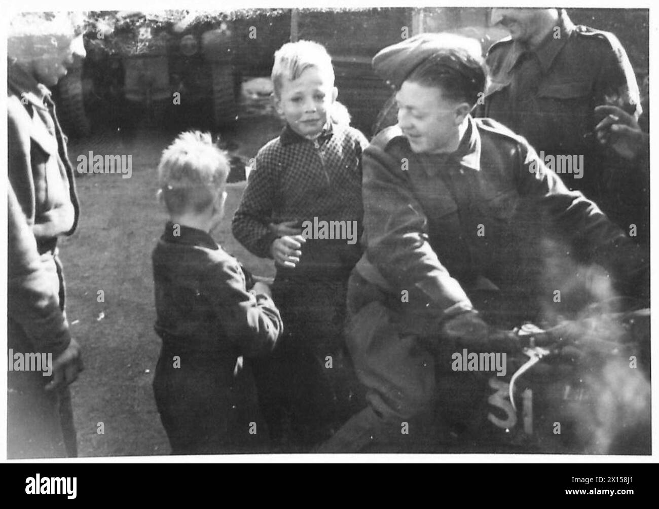 BRITISH AND CANADIAN TROOPS IN ICELAND - Children playing and ...