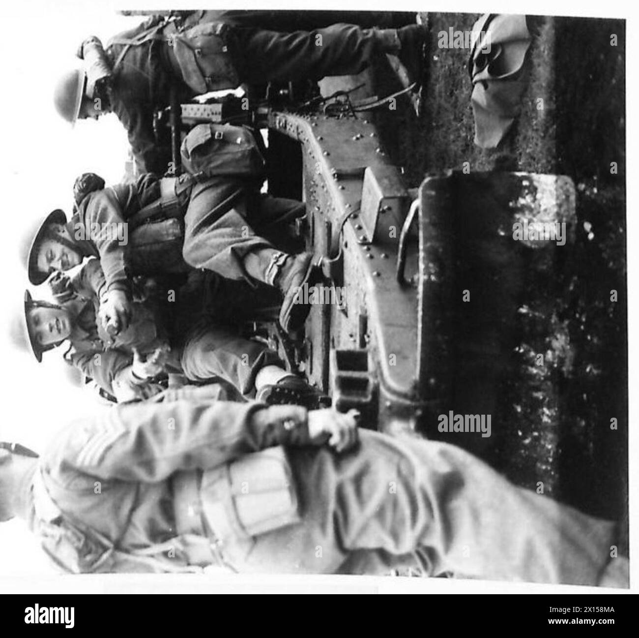 SPEEDING UP THE ARTILLERY - Ramming the shell into the breech British ...