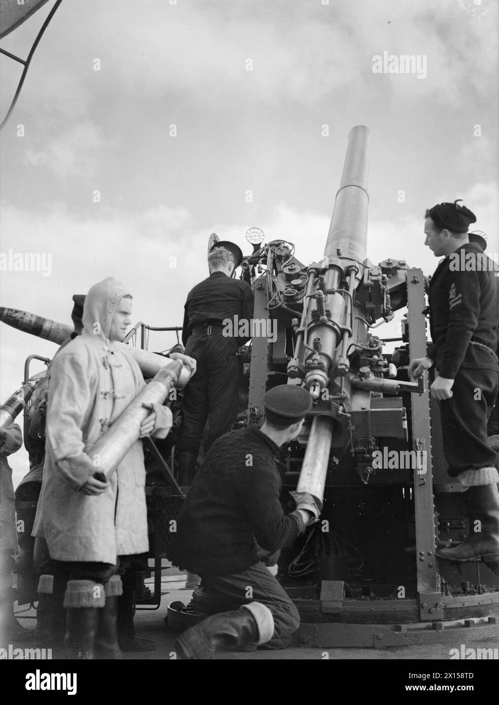 On 25 April 1942, crew on board the destroyer HMS Pathfinder loaded an ...