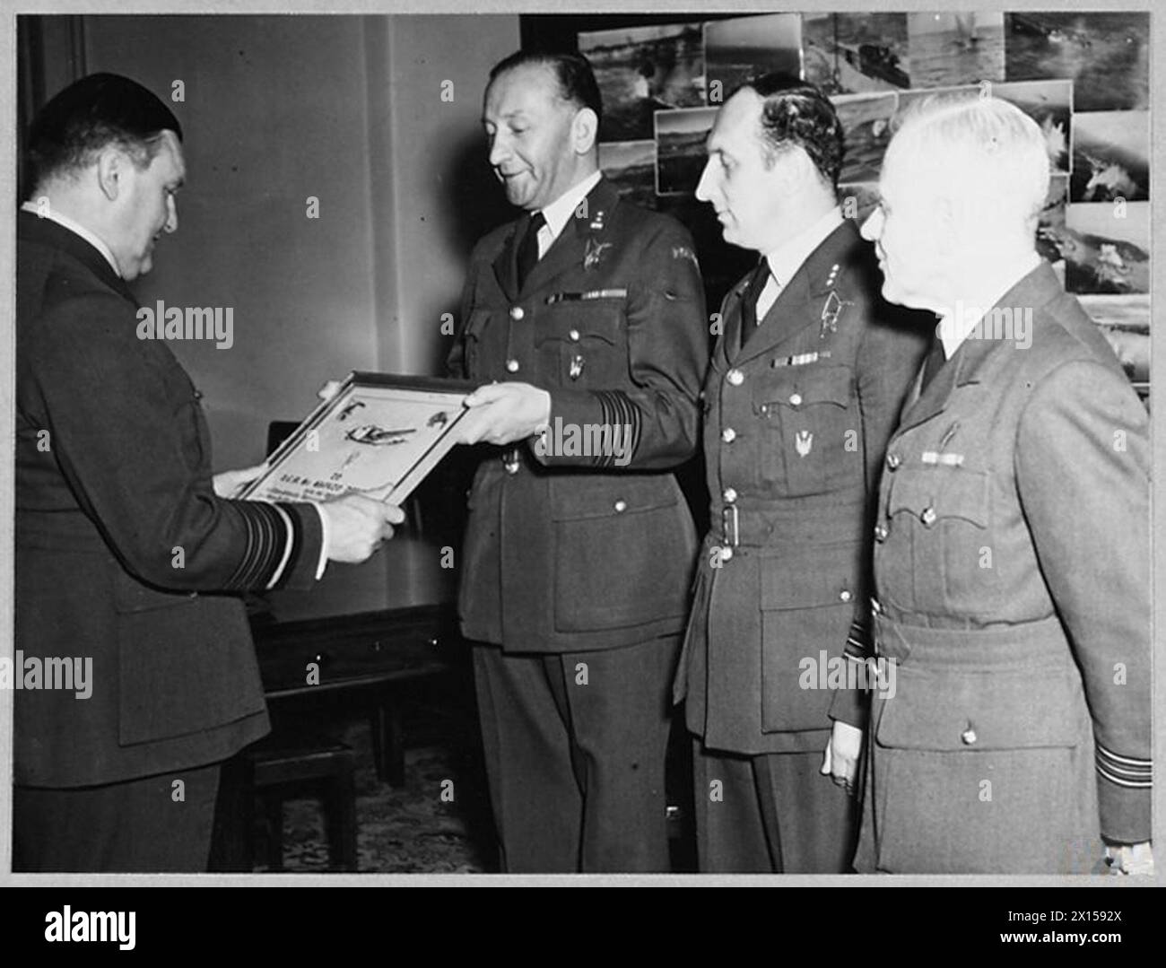 Air Chief Marshal Sir Sholto Douglas receives the Polish Squadron badge ...