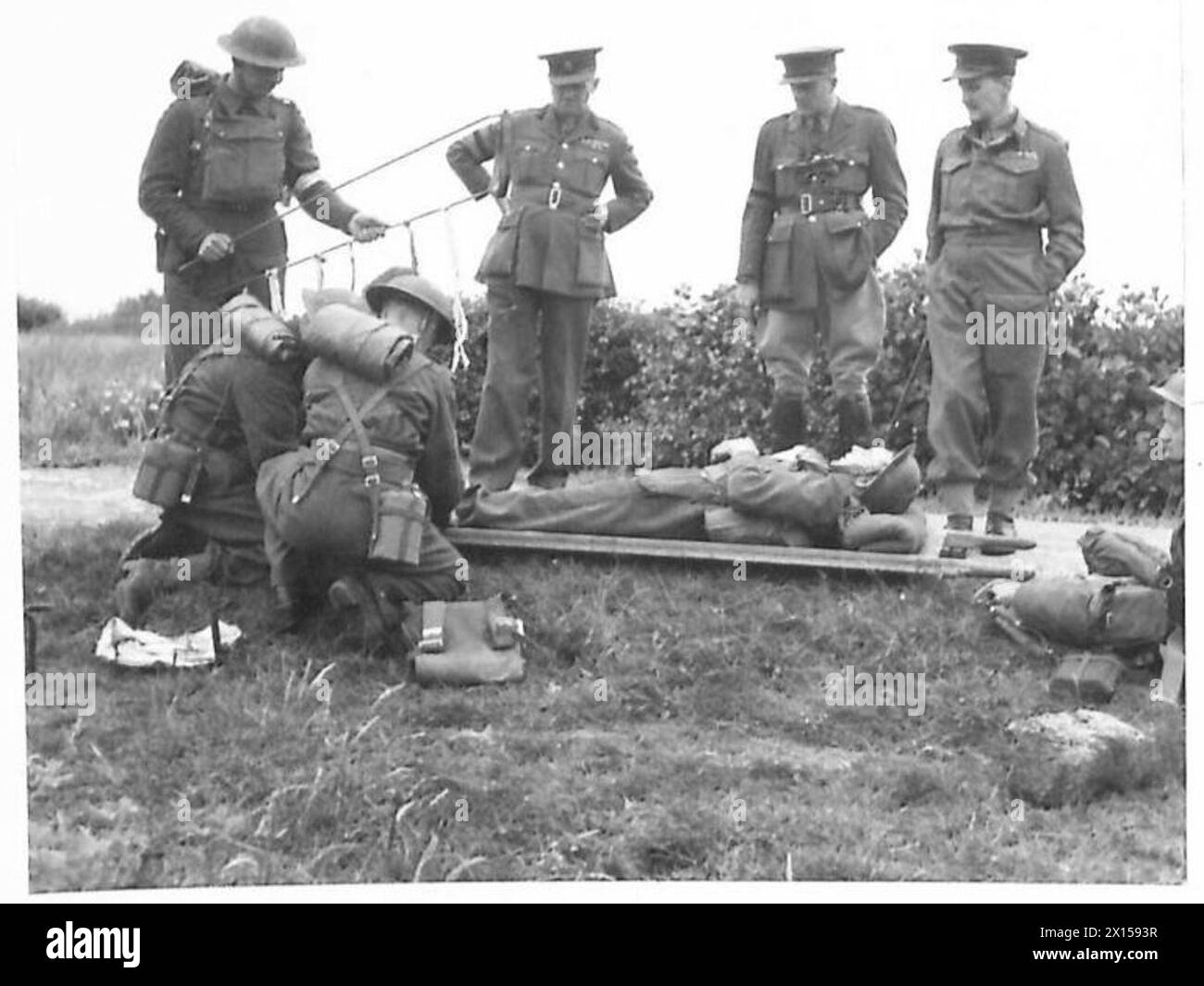 Medical personnel treat and manage wounded soldiers, providing care and ...