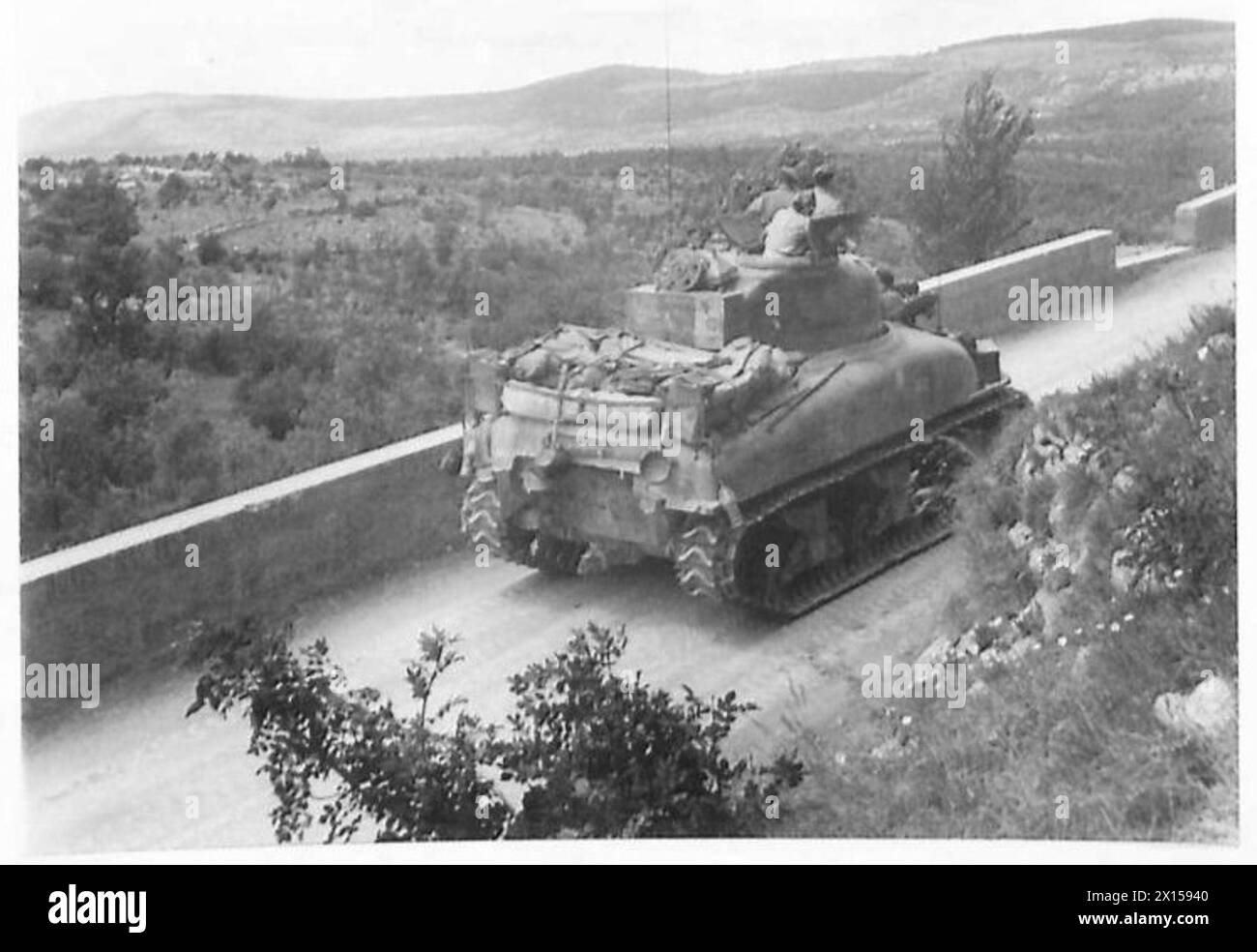 A tank advances to a support position behind infantry during Eighth ...