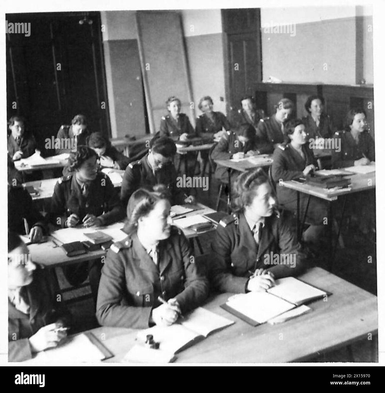 An A.T.S. officer cadet training unit studies attentiveness during ...