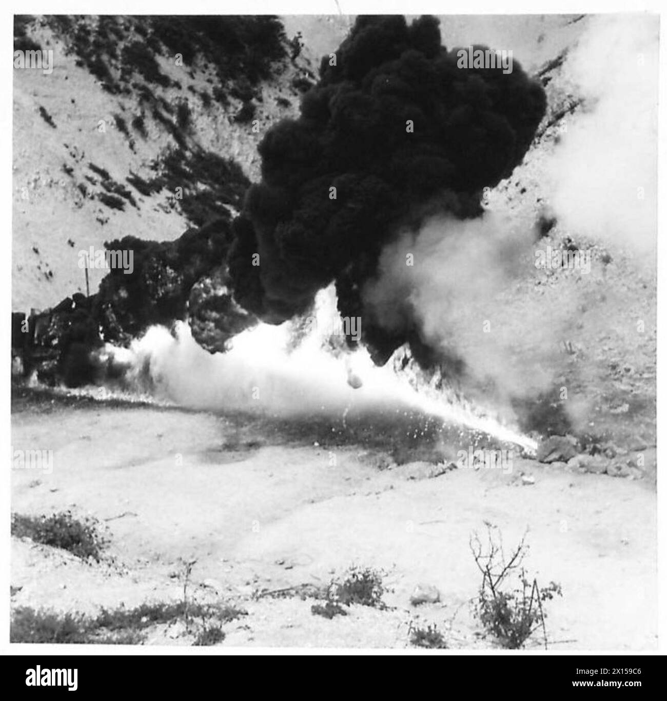 HOME GUARD TRAINING SCHOOL - Harvey flame thrower in action , British ...
