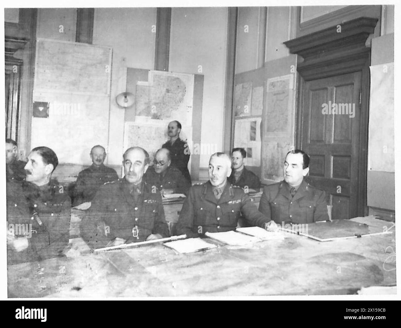 British Army corps headquarters operations room showing senior officers ...