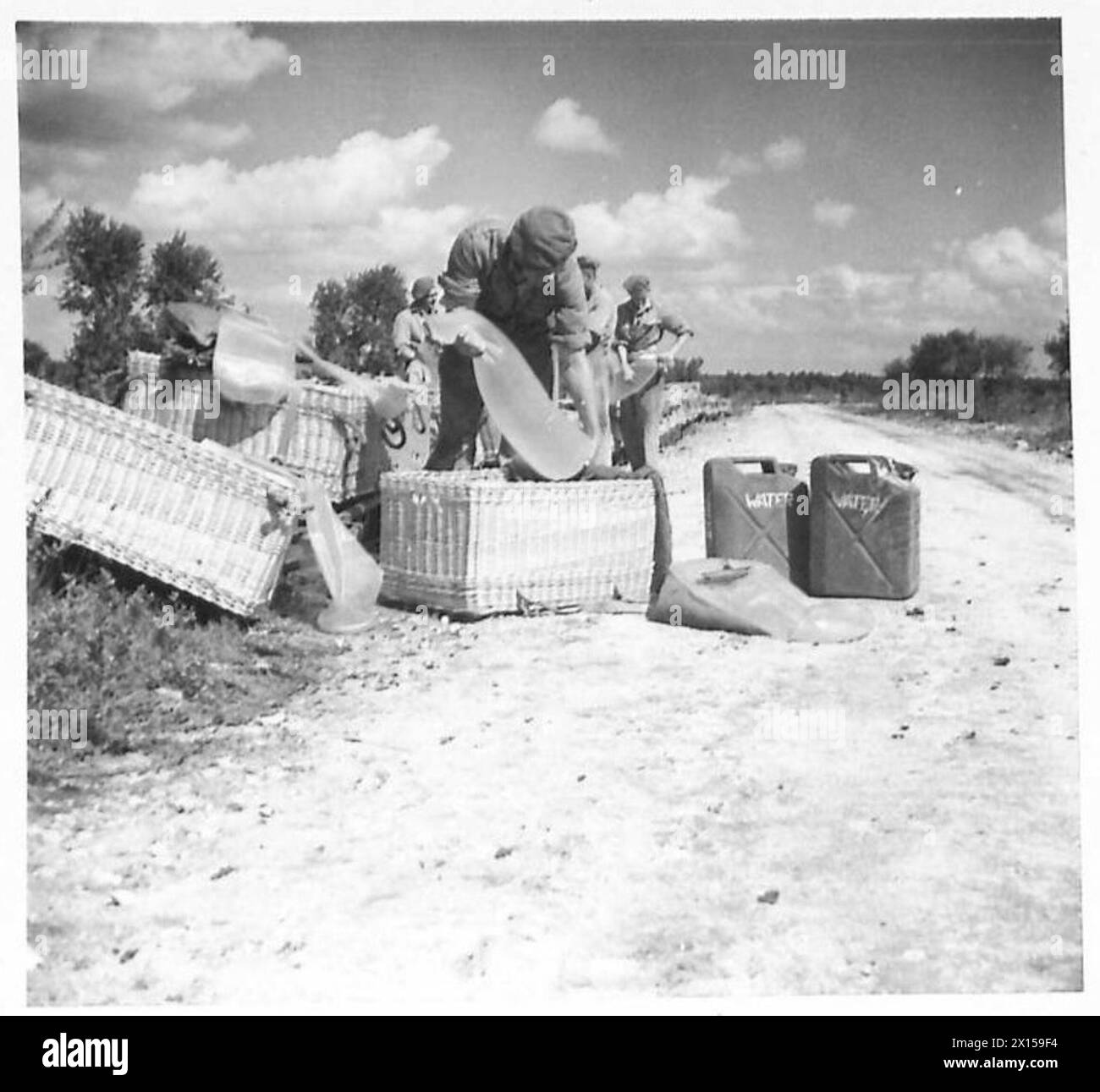 Paratroops train using translucent flexible white bags for parachute ...