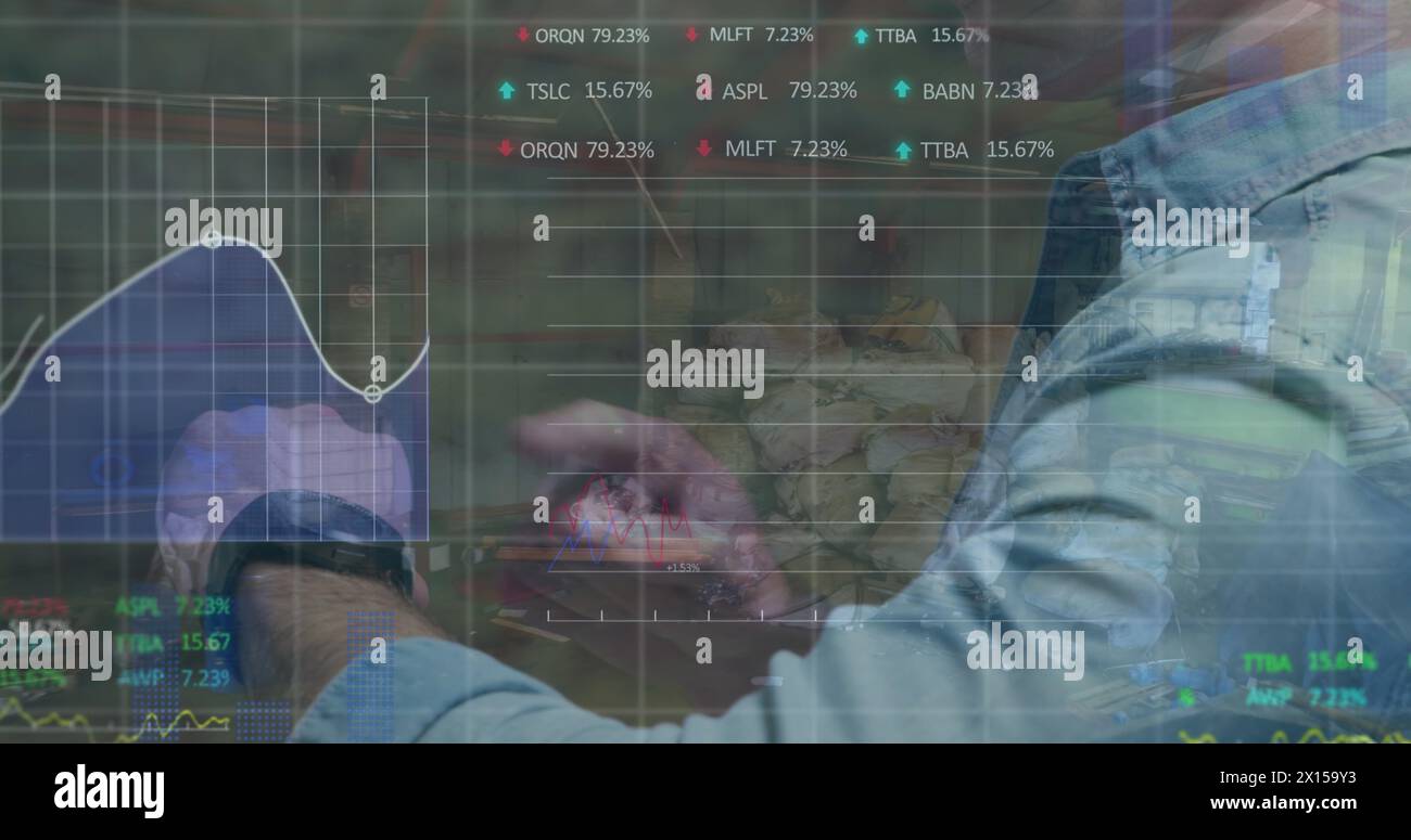 Image of financial data and graphs over midsection of caucasian ...