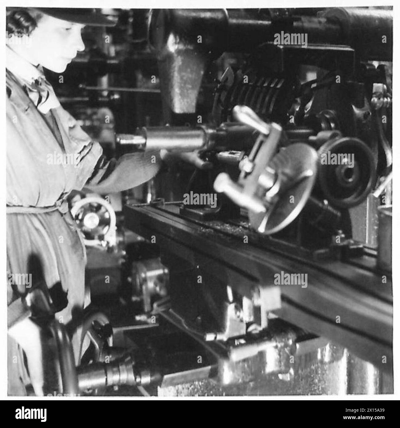 Pte. Goodwin of Walsall, Cheshire, operates a horizontal milling ...