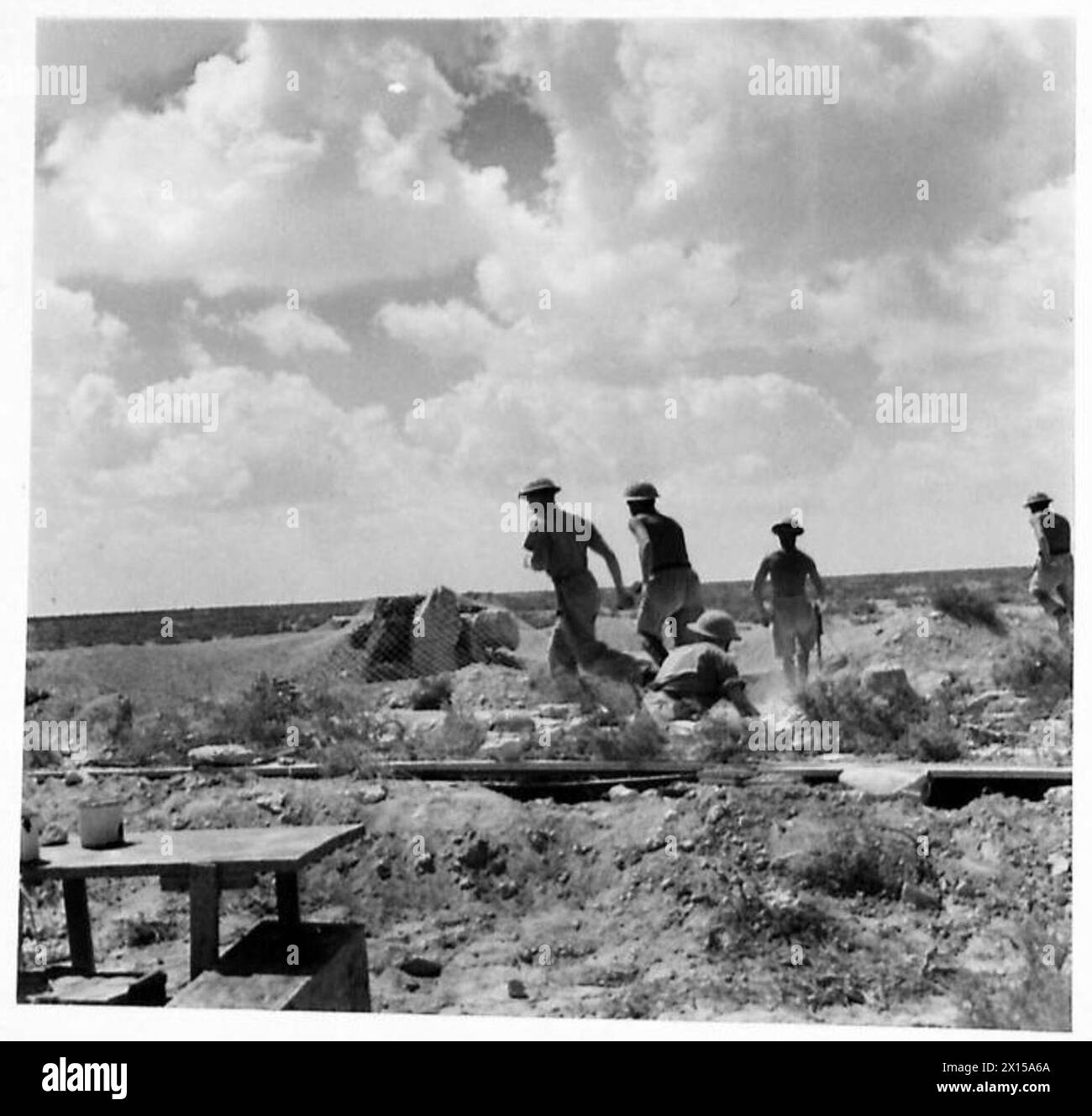 PICTURES TAKEN IN TOBRUK - The gunners of the battery running to their ...