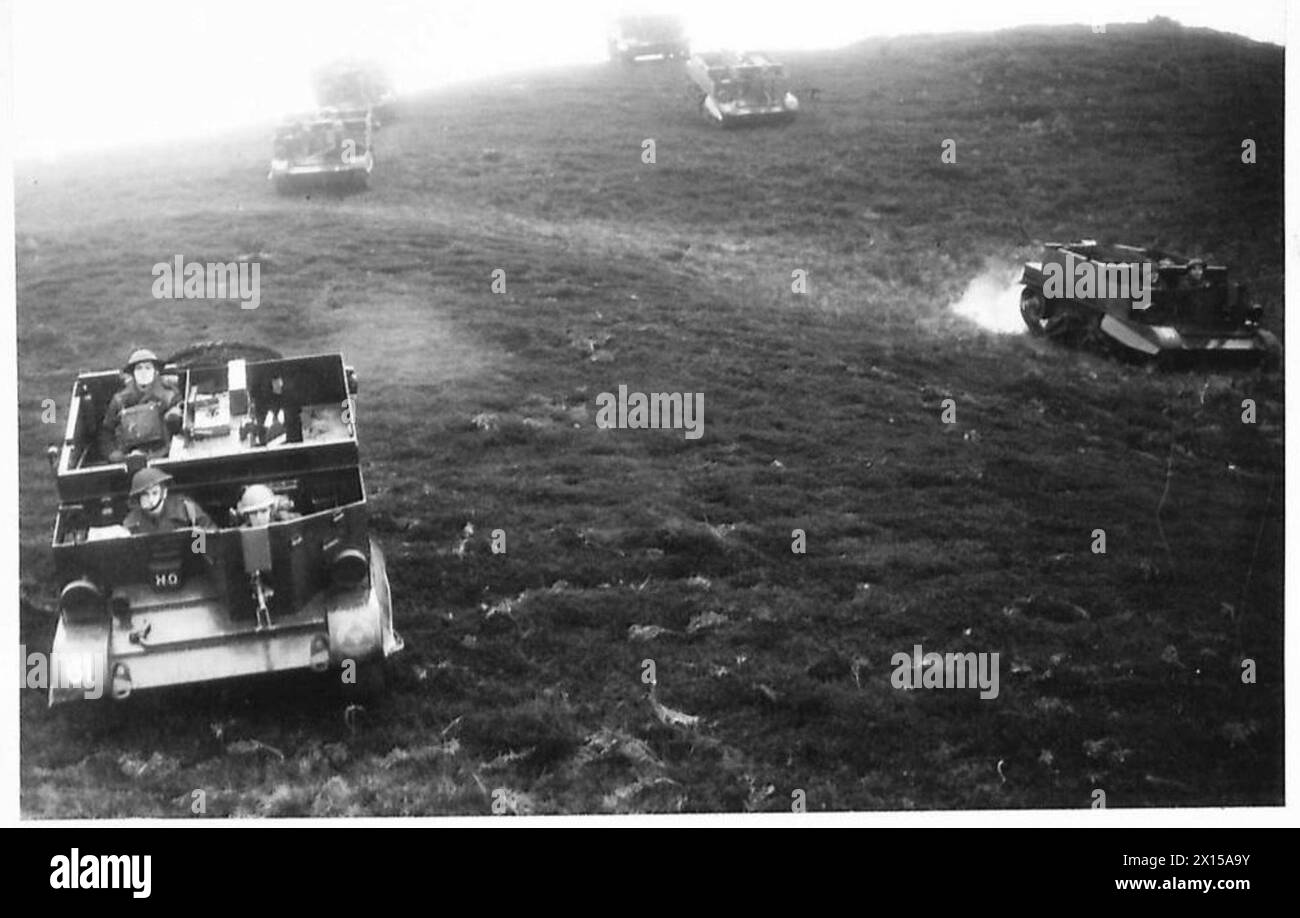 EAST YORKS IN TRAINING - Bren carriers going into action over rough ...