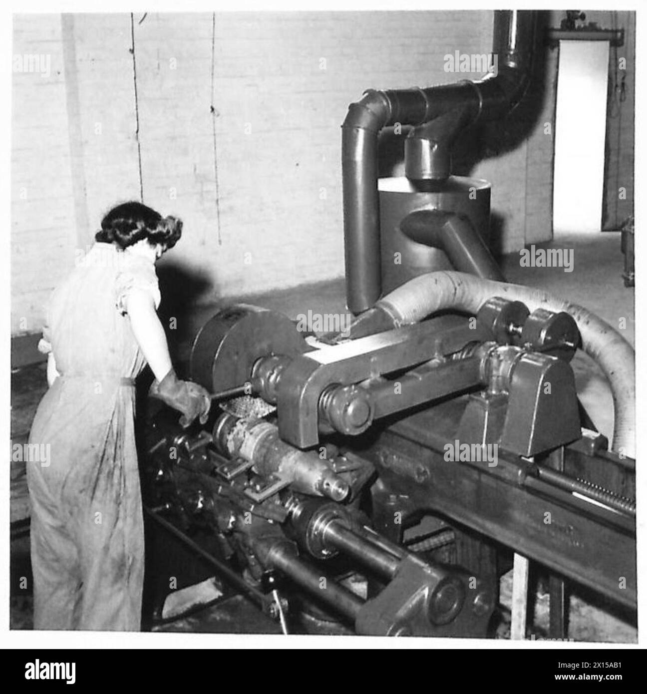 Machine shown in operation hi-res stock photography and images - Alamy