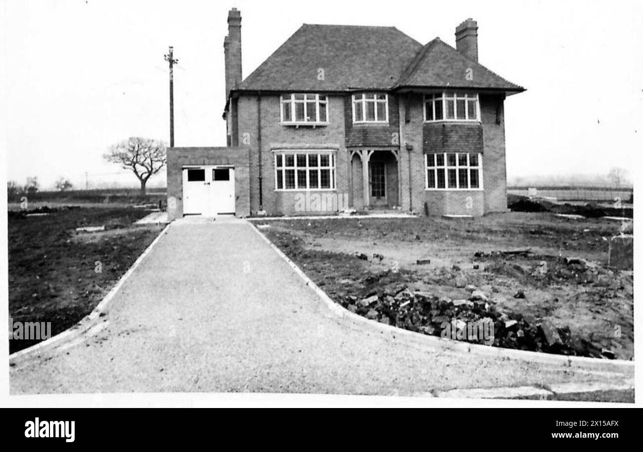 Photographs document the buildings of the Central Ordnance Depot at ...