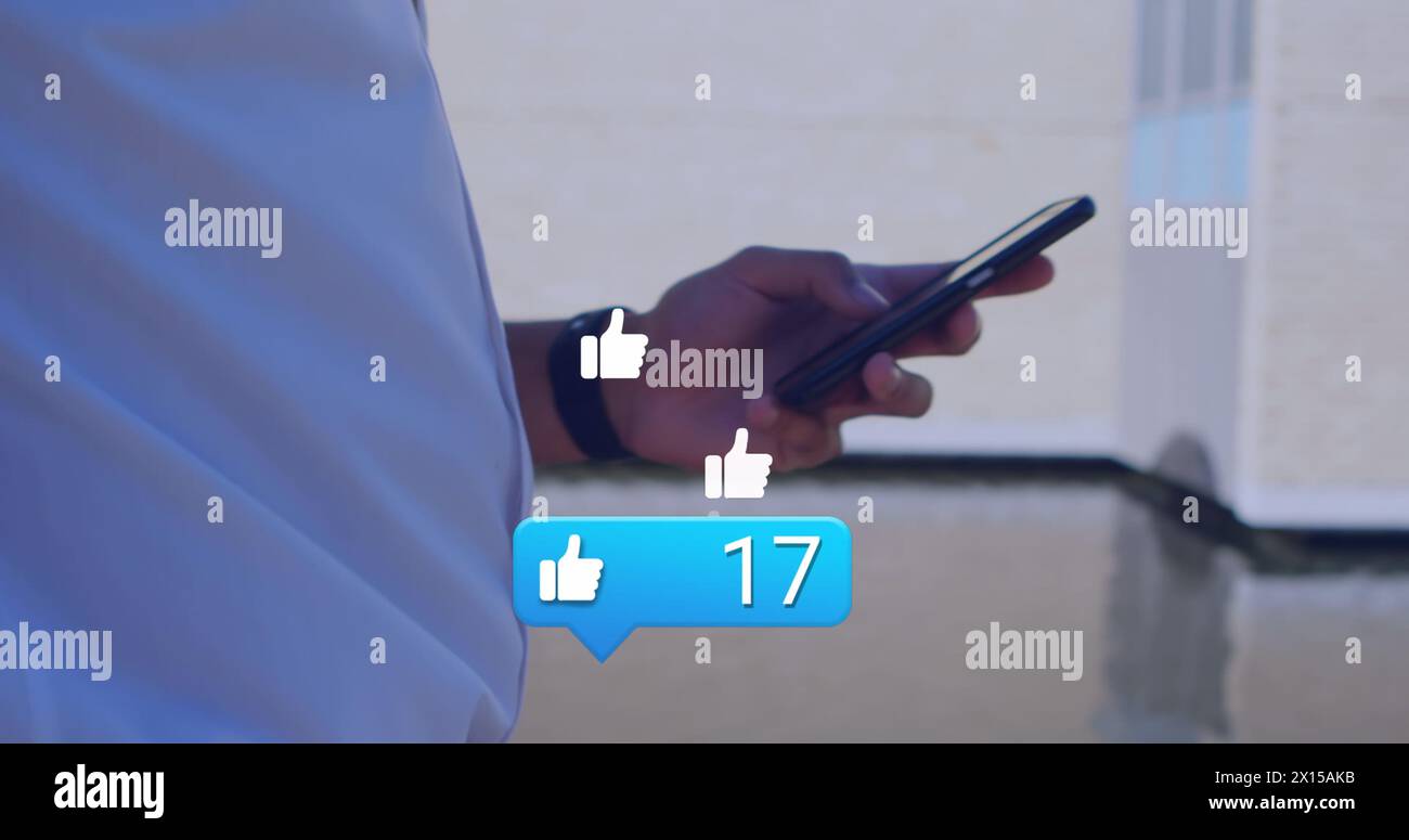 Image of falling social media icons over person using smartphone Stock ...
