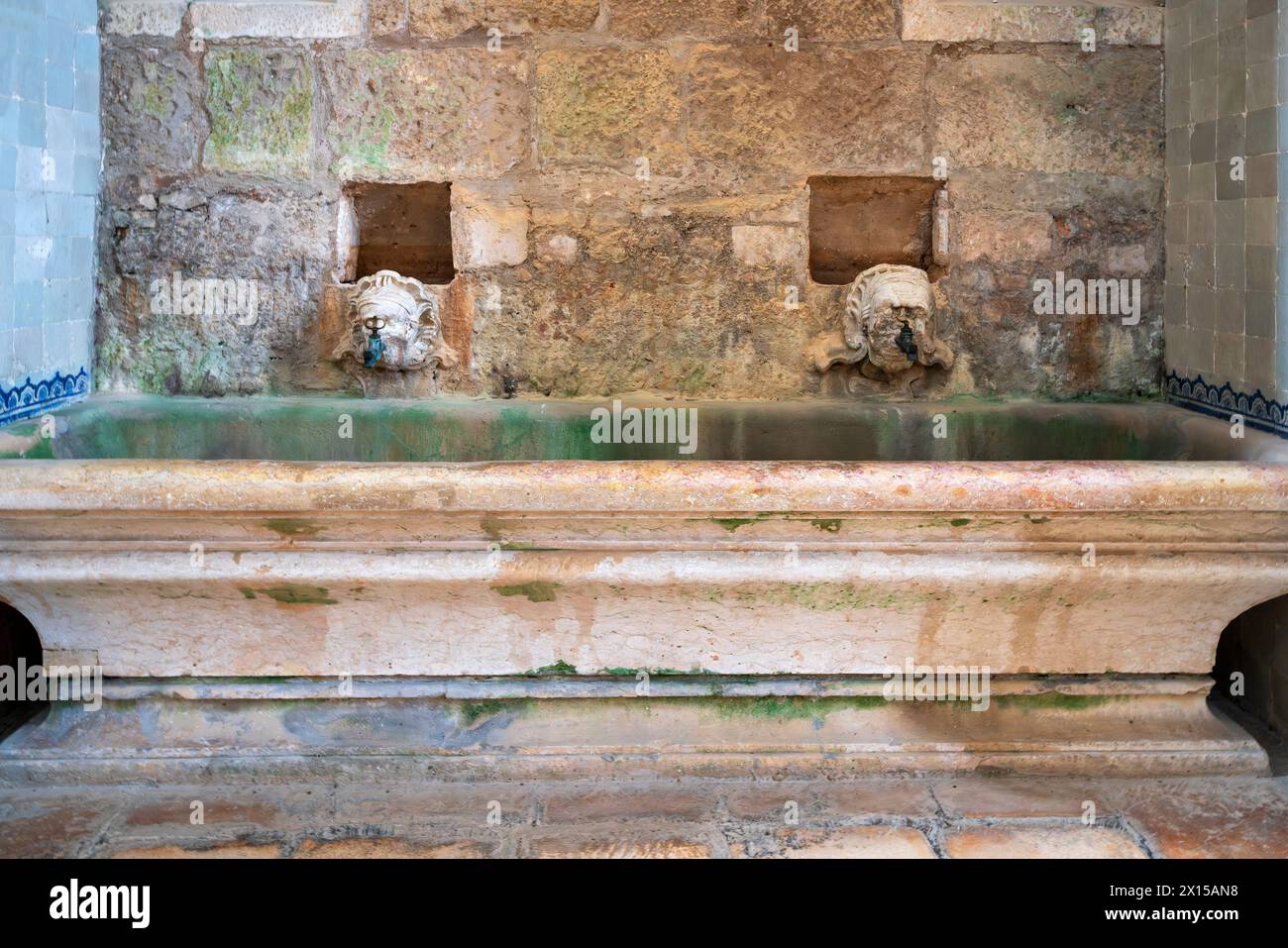 The ater tap and sink inside monastery’s kitchen. The Alcobaça ...