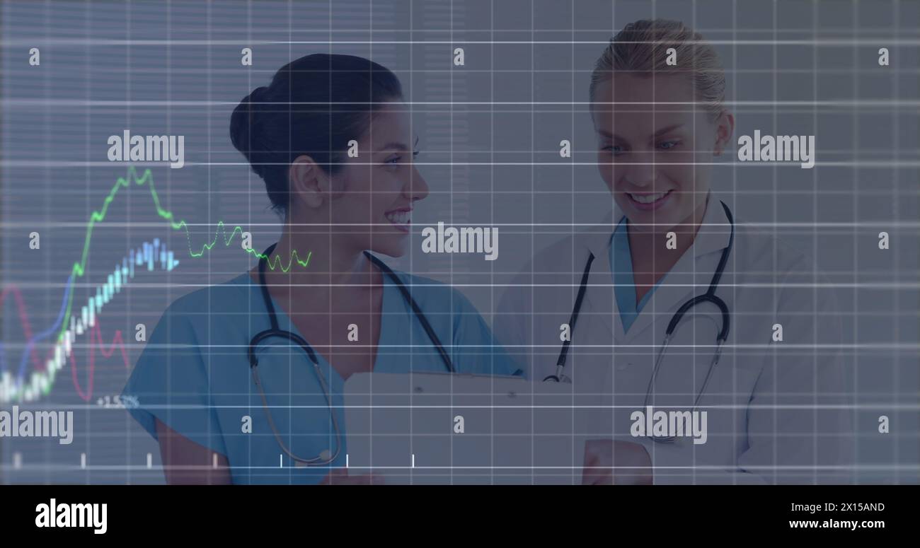Image of financial data processing over two caucasian female doctors ...