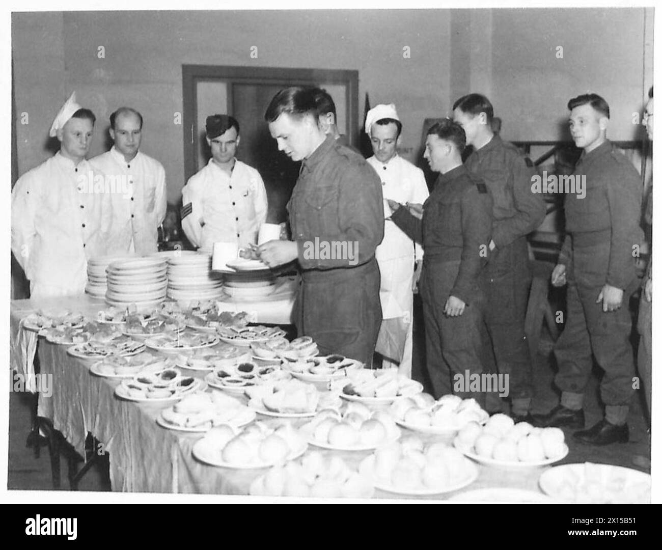 "HELP YOURSELF" - The men passing along the counter in queue and ...