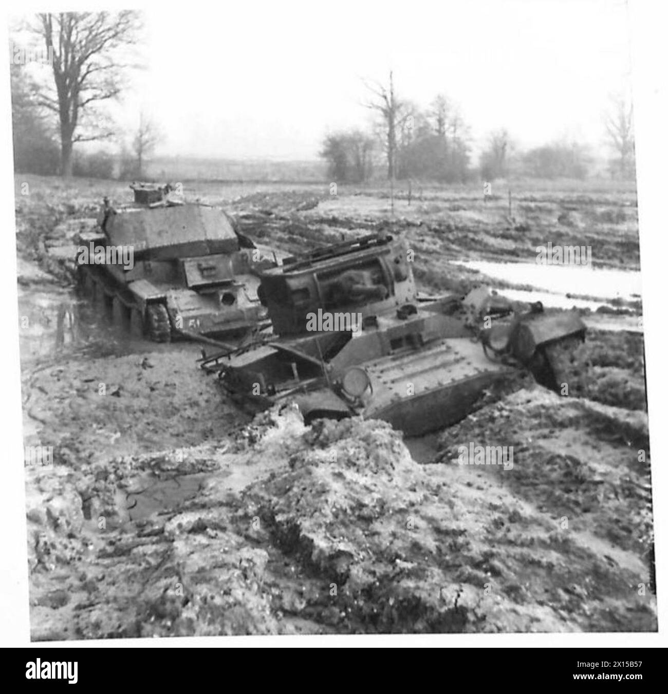 A MUD TEST FOR TANKS - The Valentine successfully tows another tank ...
