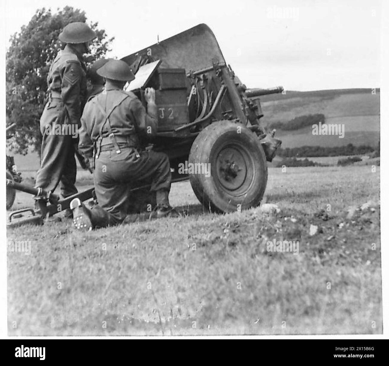 The 2-pounder Mark III anti-tank gun and its gun team operate as part ...