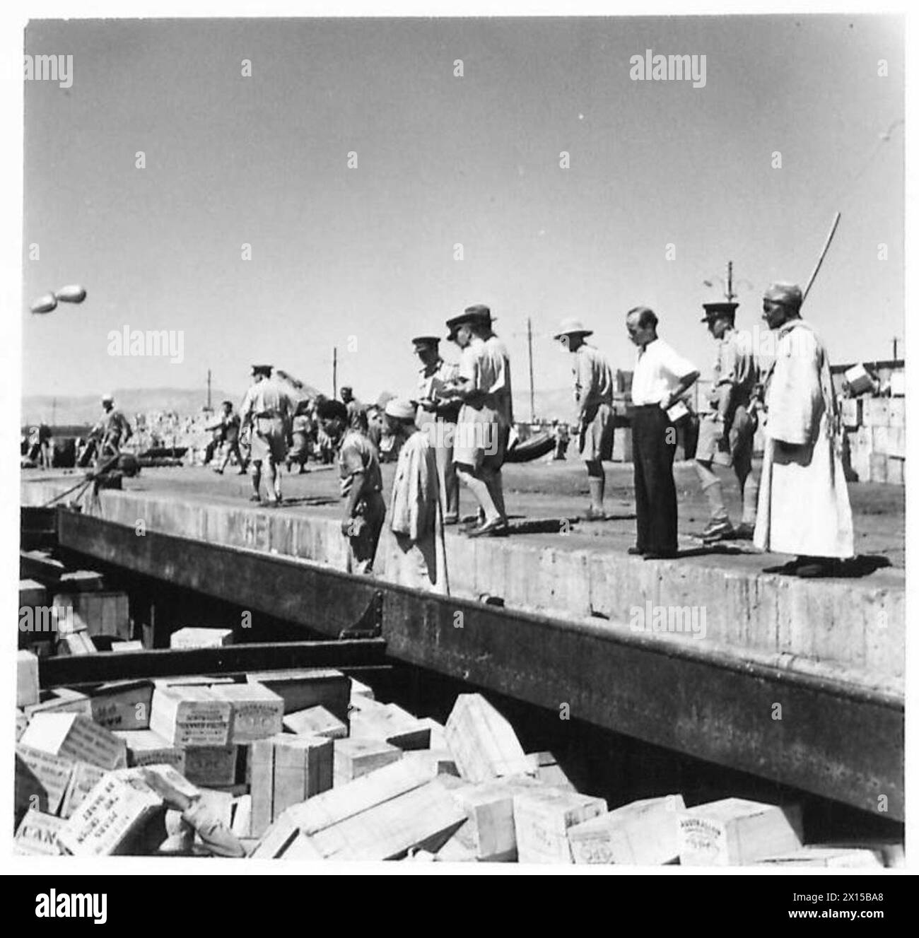 General Sir Robert Haining and the Minister of State inspect a barge ...