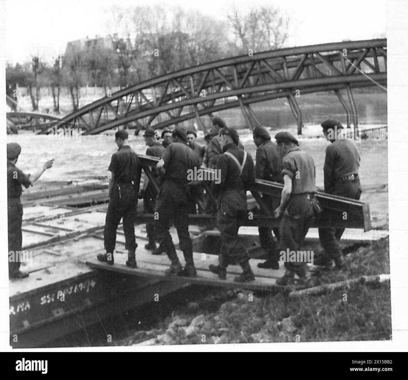 BRIDGING THE WESER - Carrying a panel of the bridge to a pontoon. The ...