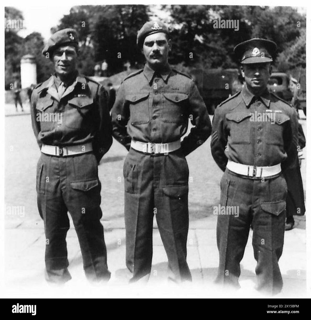 CROIX DE GUERRE PRESENTED TO BRITISH TROOPS IN GERMANY - Left to right ...