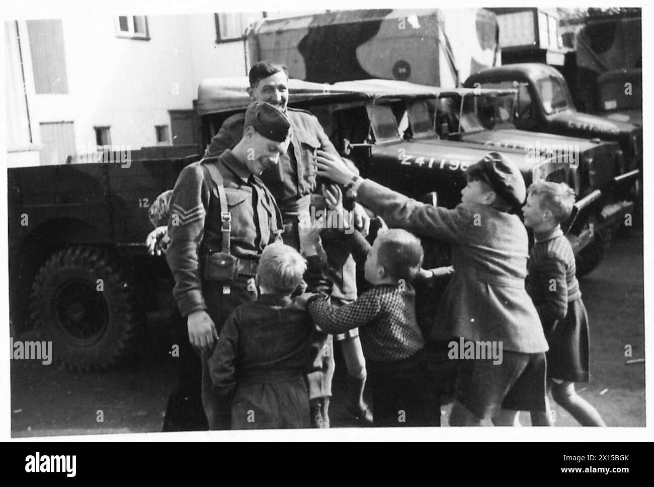 BRITISH AND CANADIAN TROOPS IN ICELAND - Children playing and ...