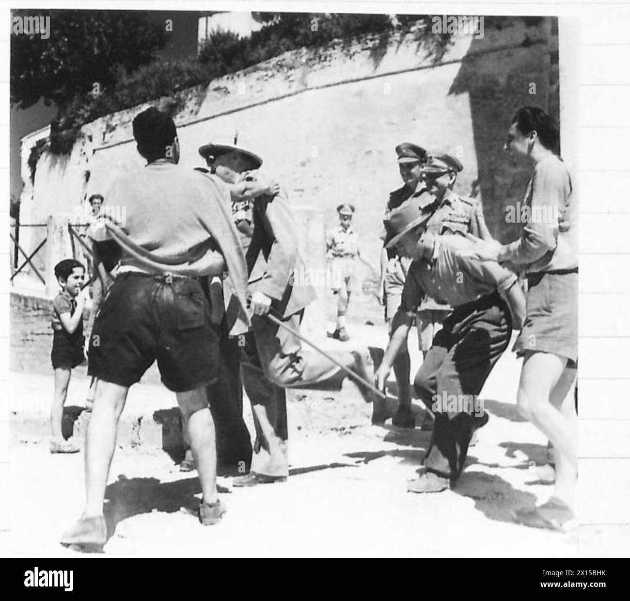 Walking stooping Black and White Stock Photos & Images - Alamy