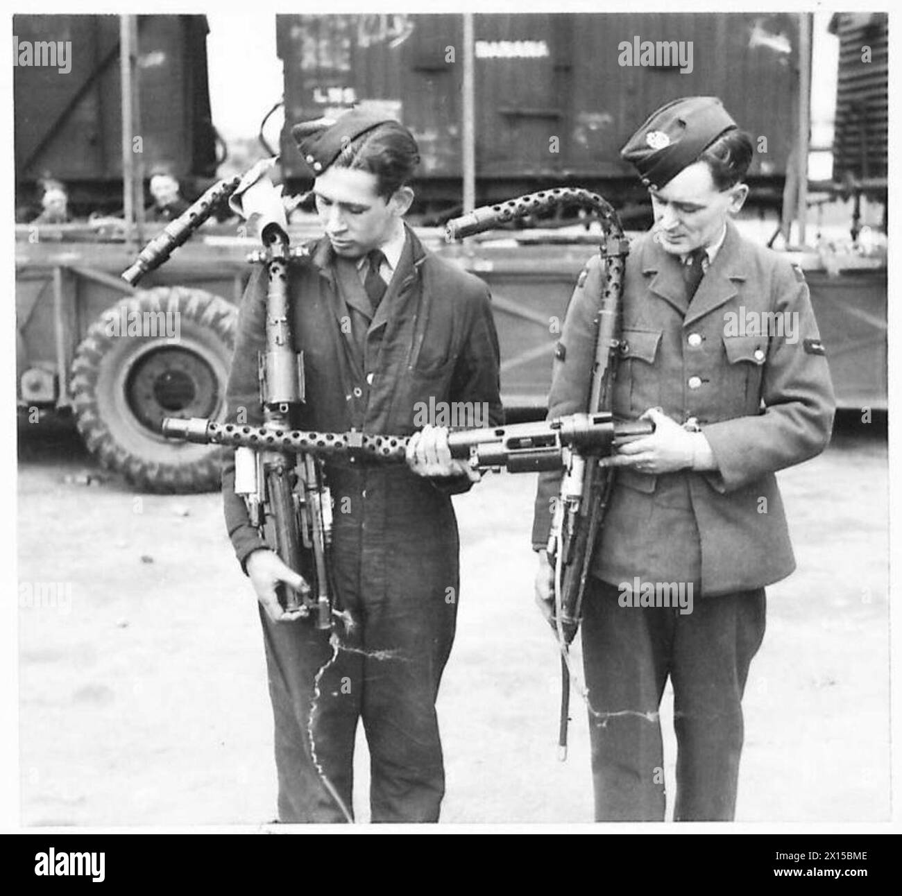 R.A.F. mechanics inspect and maintain armaments on Hess's Messerschmidt ...