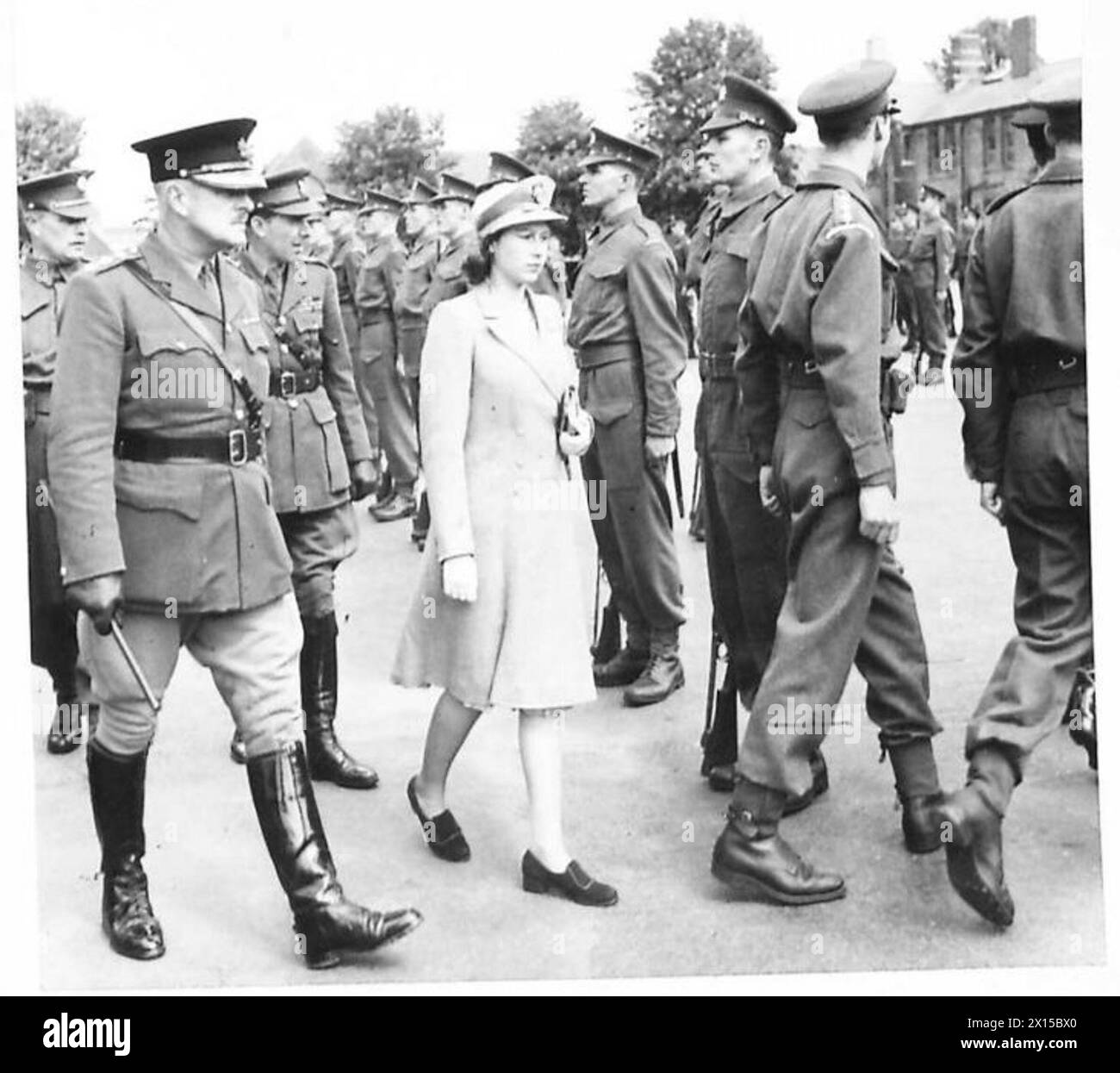 PRINCESS ELIZABETH'S VISIT TO THE GUARDS - The Princess walking round ...